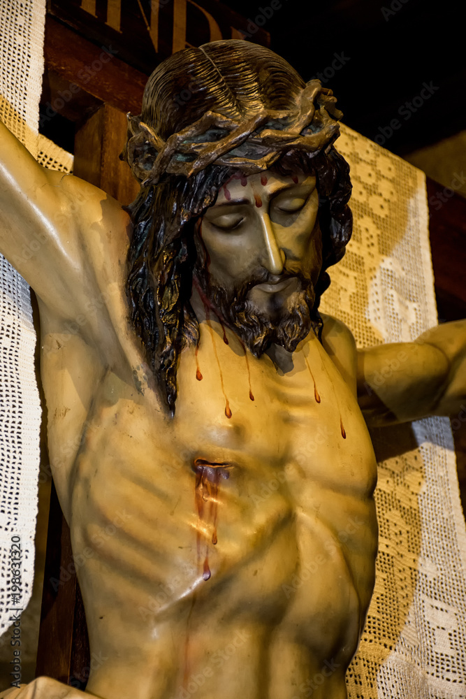 Foto de Detalle de cristo crucificado do Stock | Adobe Stock