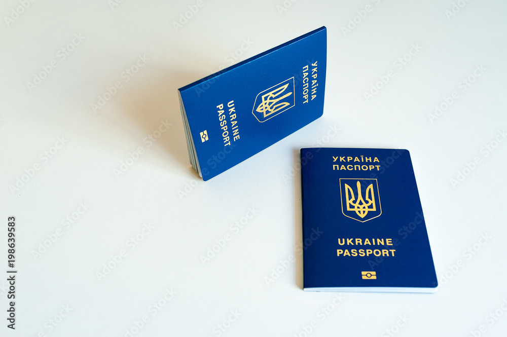 New ukrainian blue biometric passport with identification chip and old ...