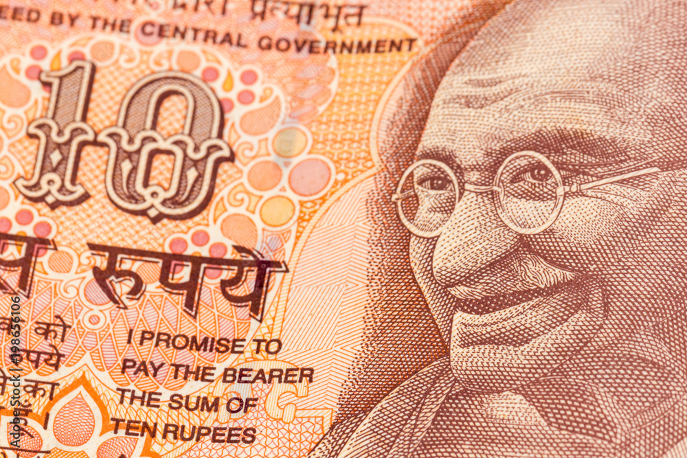 close-up 10 indian rupee frontside with Mahatma Gandhi. Background ...