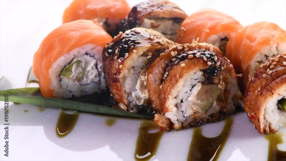 Sushi roll set on white background. Rotated California set with salmon ...