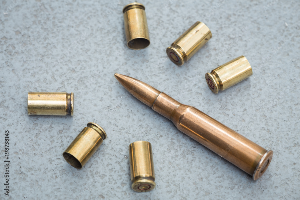 cartridges and scales from various types of weapons Stock Photo | Adobe ...