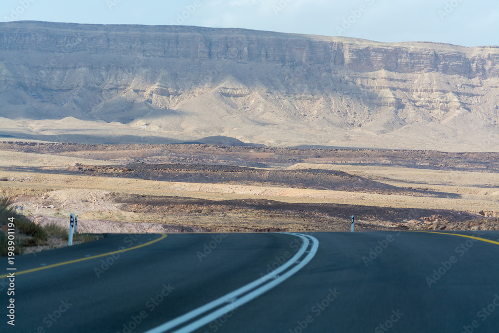 Asphalt road in desert Negev, Israel, road 40, transport infrastructure ...