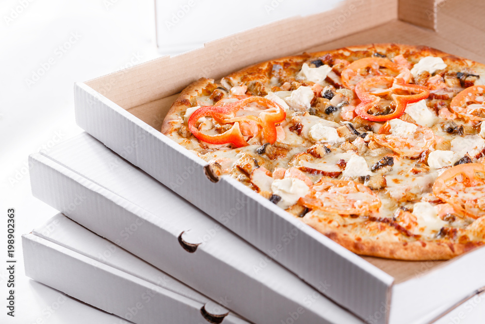 Pizza box delivery concept. Open box with hot tasty italian sliced ...