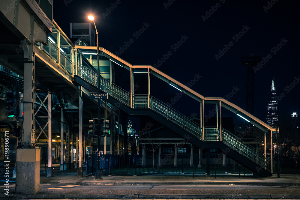 Vintage Chicago elevated CTA train subway station at night with the ...
