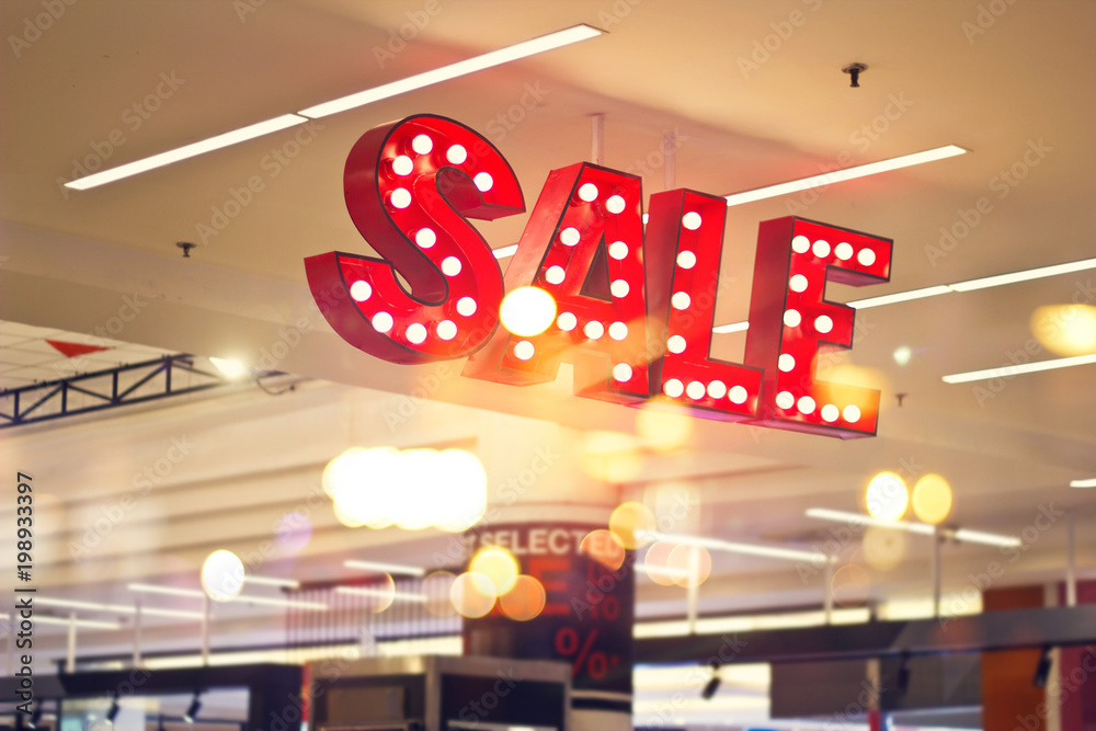 Red metal signage shop lighting on shopping mall background Stock Photo ...