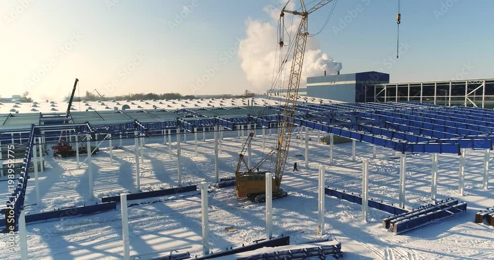 Construction of a modern factory or plant, Industrial area in winter ...