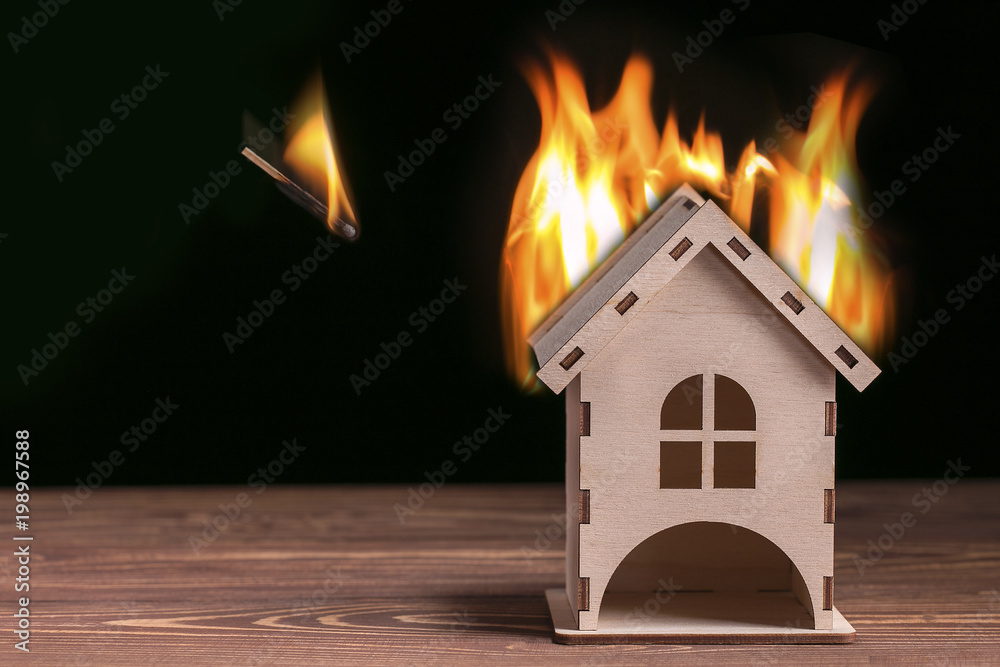 House fire concept. Toy house with flames and match with fire Stock ...