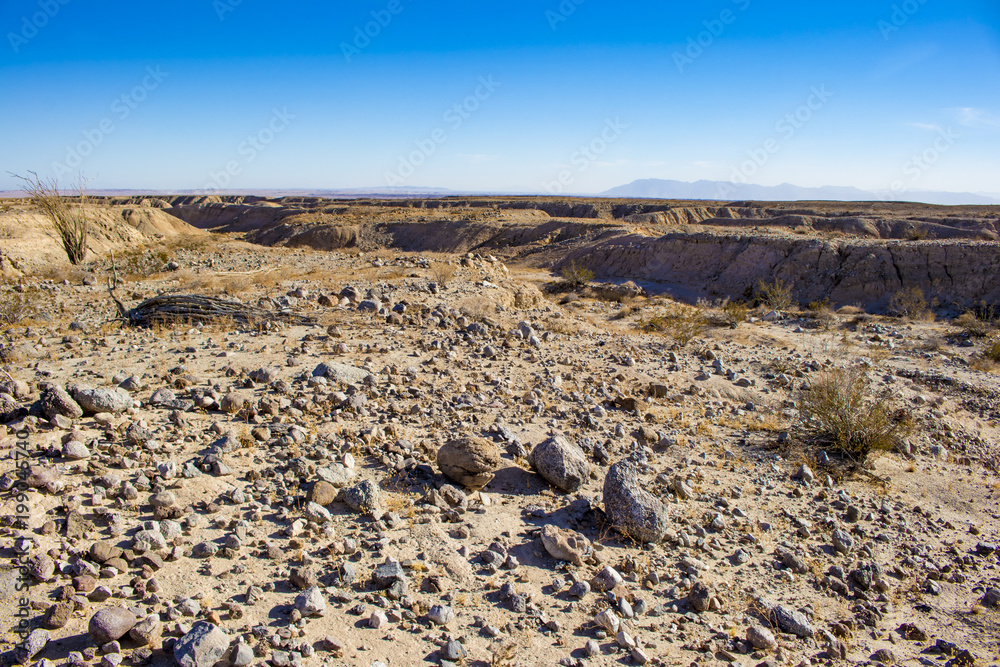 Rocks Lining the Empty Barren Landscape in front of a Gorge in the Anza ...