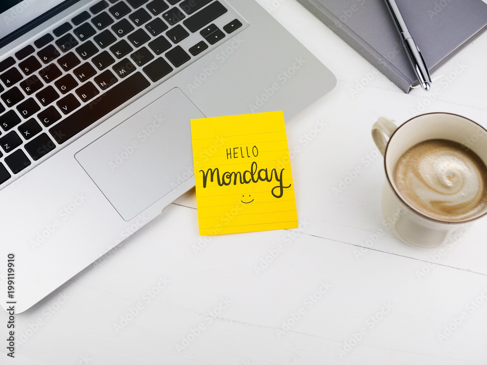 Hello Monday text with smiley face on sticky note on desk Stock Photo ...