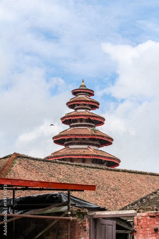 Round, multi-tiered tower in Nasal Chowk Courtyard of Hanuman Dhoka ...