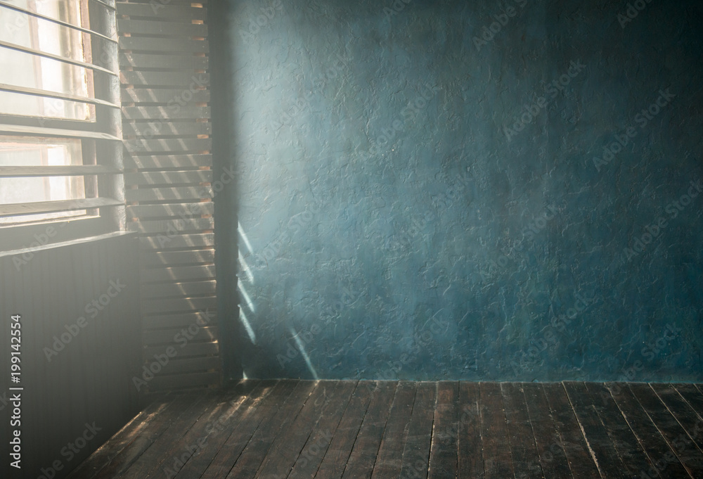 Empty dark room with light from the window Stock Photo | Adobe Stock