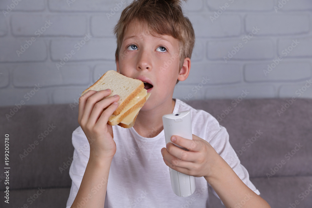 Children bad eating habits, Kid eating unhealthy junk food sandwich and ...
