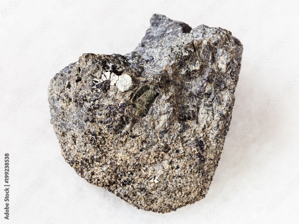 raw peridotite stone with phlogopite mica on white Stock Photo | Adobe ...