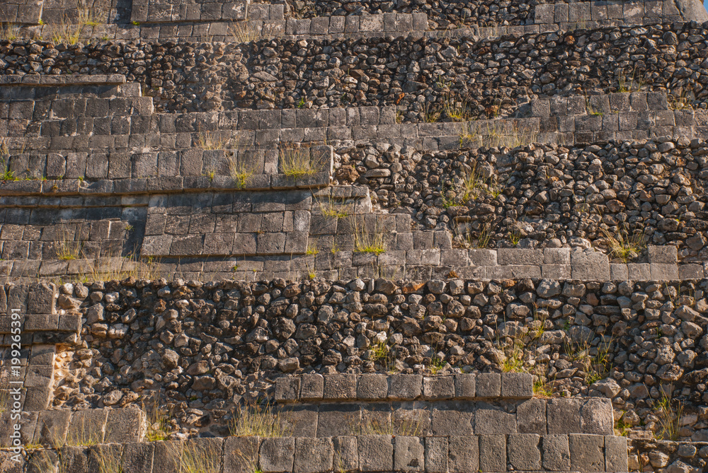 The texture of the stone. Anicent Maya mayan pyramid El Castillo ...