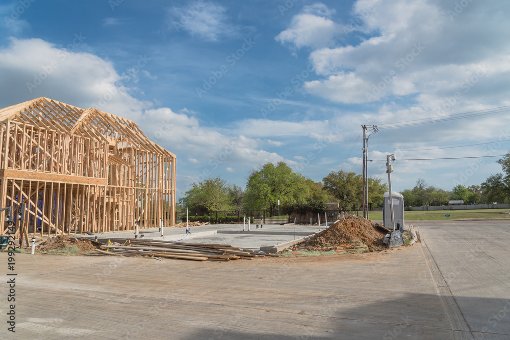 Single-family timber frame house with slab-on-grade concrete foundation ...