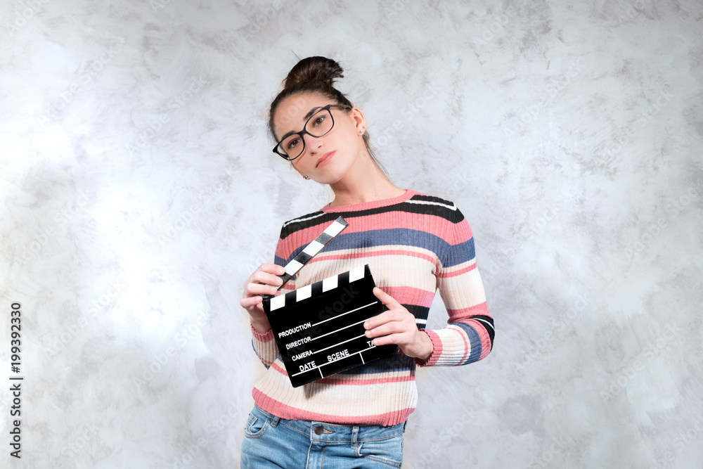 Young actress audition posing with movie clapper board Stock Photo ...