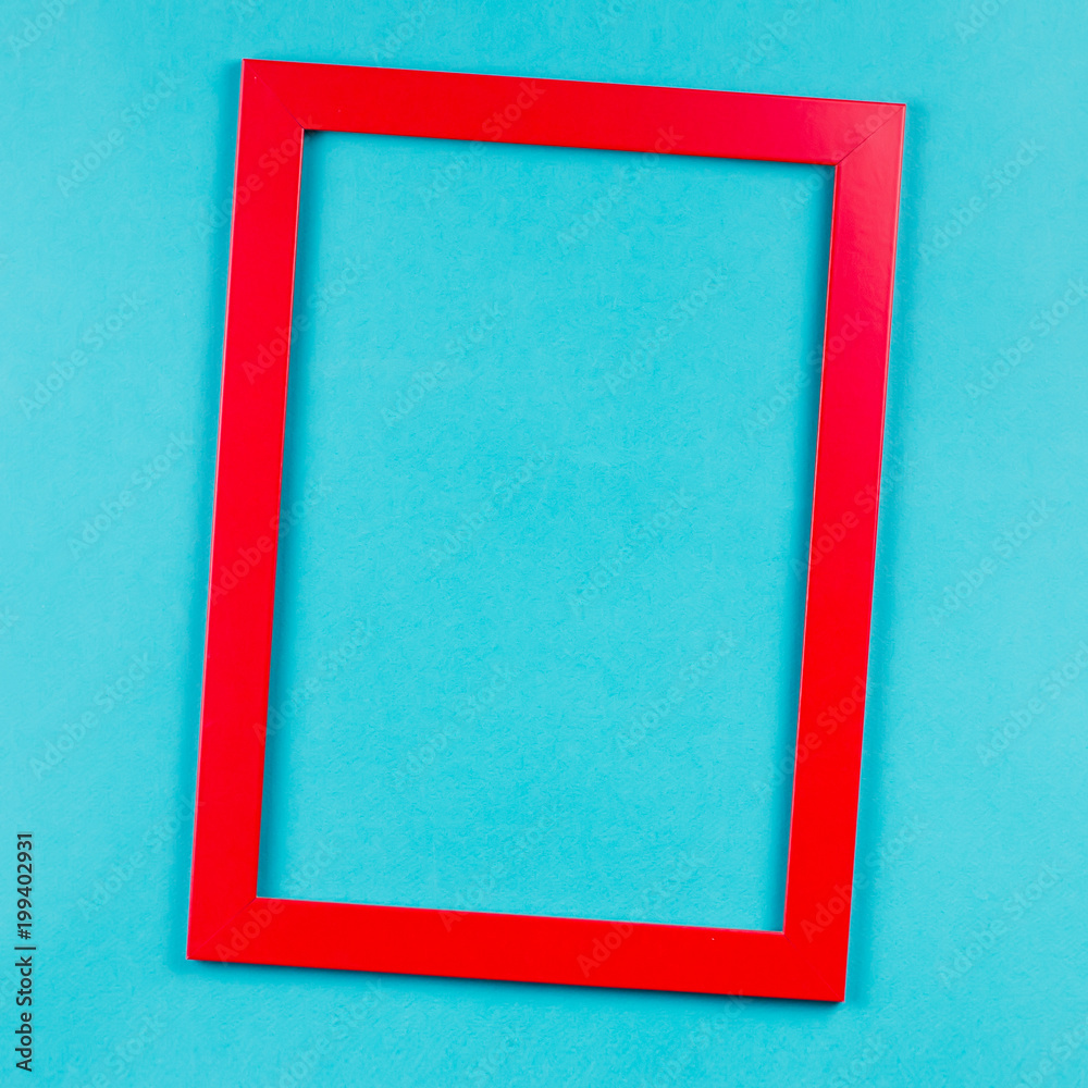 Red color frame on bright blue background. Stock Photo | Adobe Stock