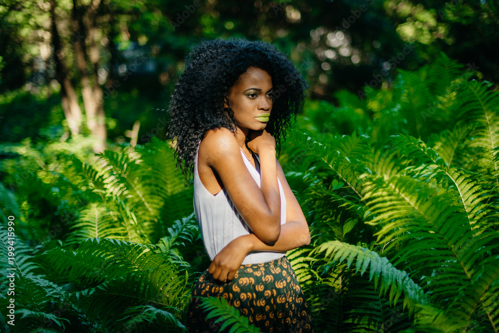 Half-length horizontal portrait of the attractive african model with ...