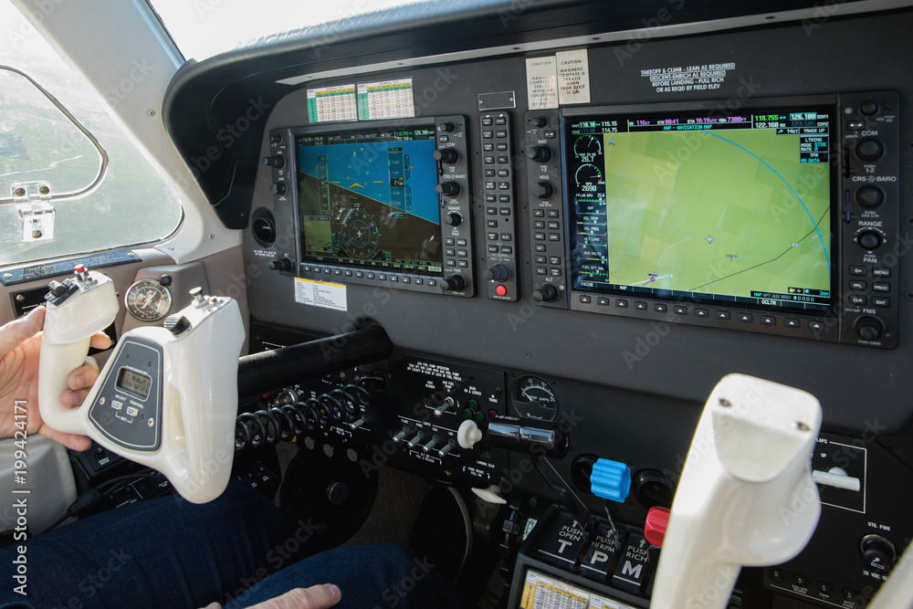 Cockpit of small, sport aircraft. A view of a glass cockpit dashboard ...