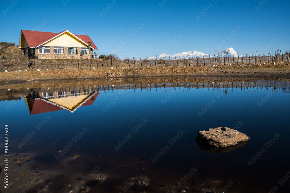 landscape of Tonglu trekkers hut and Kangchenjunga mount during blue ...