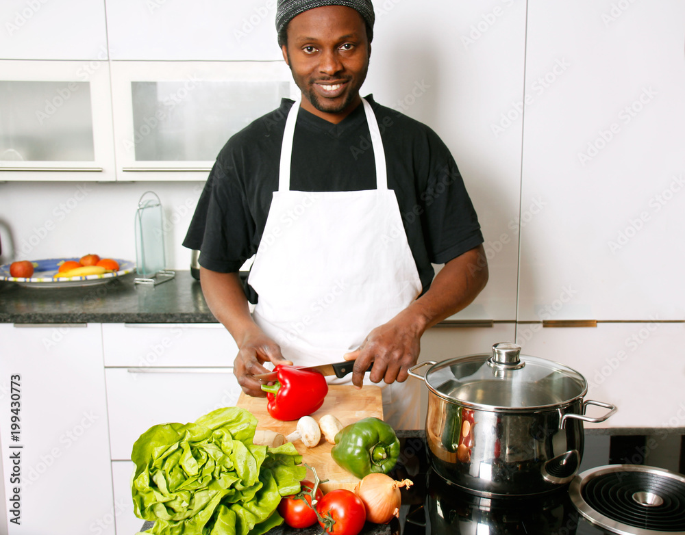 Chef cooking in the kitchen Stock Photo | Adobe Stock
