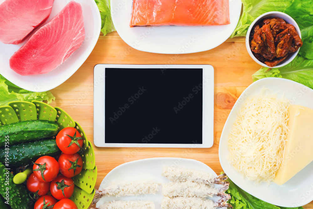 Still life on a wooden table lie products between which the center is a ...