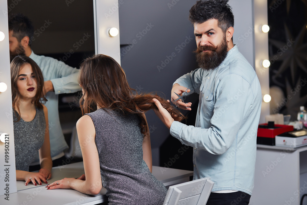 Girl Getting Haircut In Barber Shop