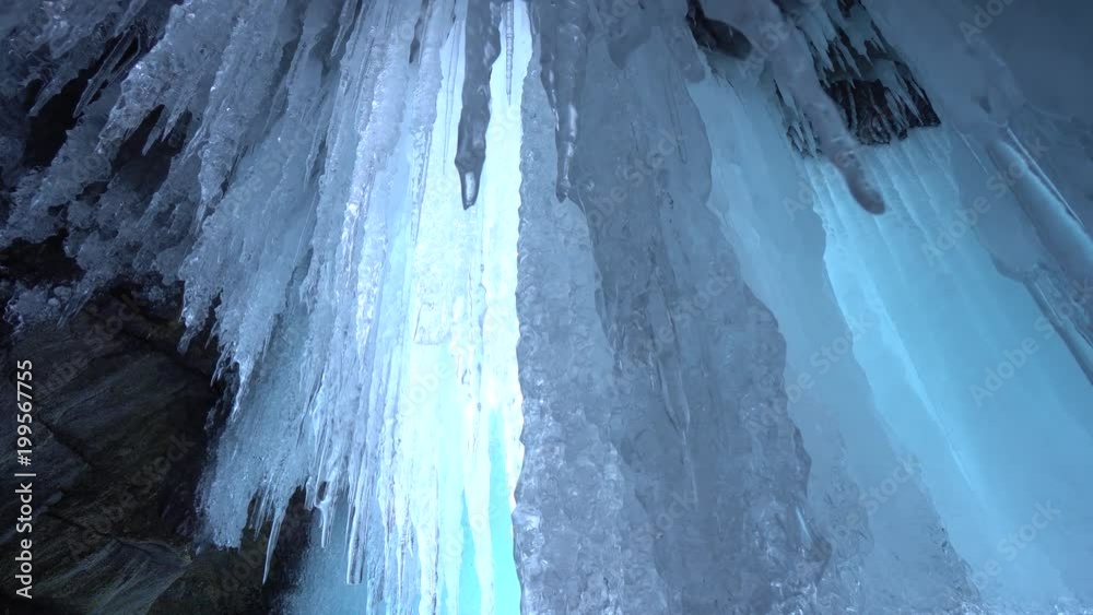 Vidéo Stock Dolly Close Aaround shiny transparent sharp blue ice ...