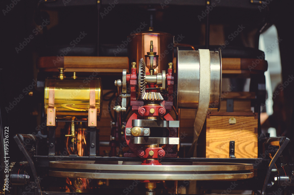 beautiful retro steam engine, polished and well-groomed, made of copper ...