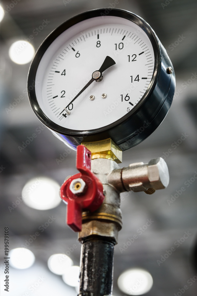 pressure gauge for measuring water or installed in gas systems. focus ...