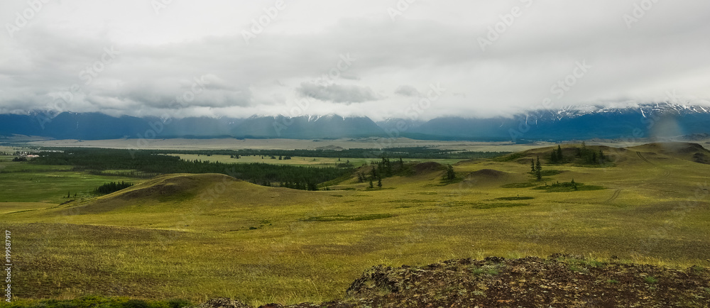 Altai mountains landscape. The mountain range behind the steppe and ...