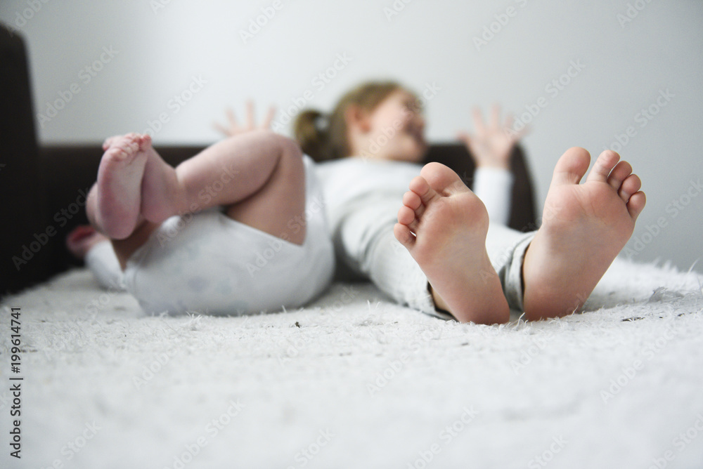 feet of young children Stock Photo | Adobe Stock