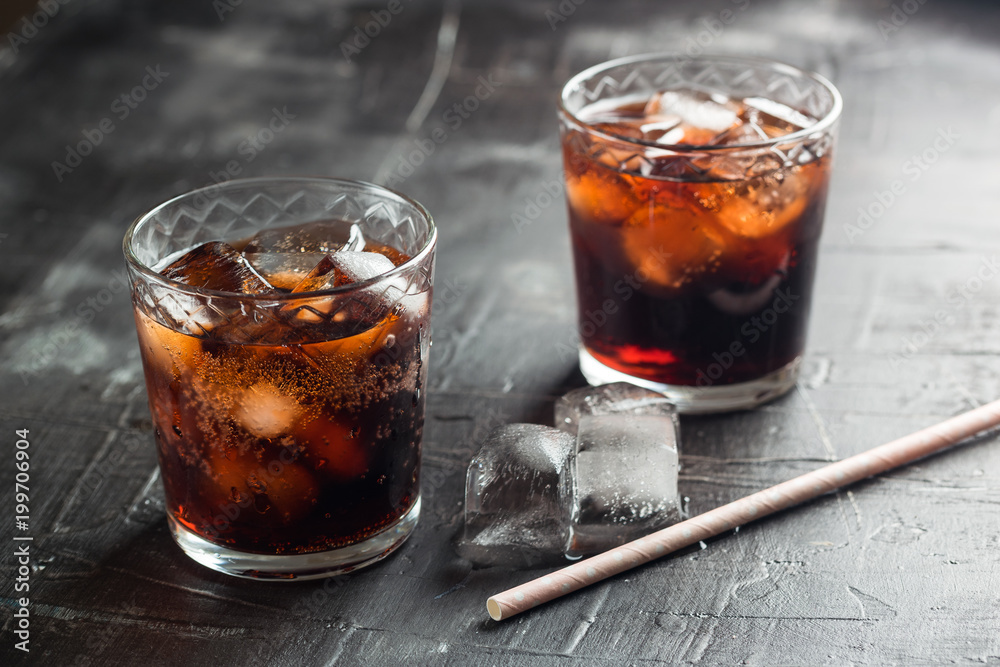 Rum and cola with ice. Cold cocktails for summer parties. Alcohol ...