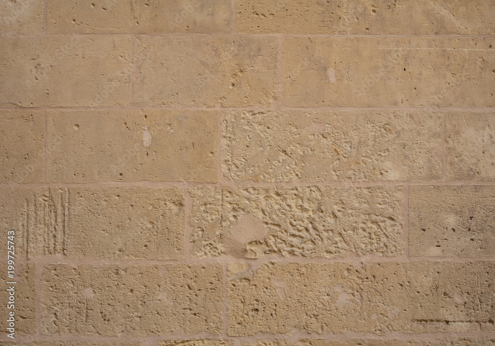 Traditional weathered stone wall background in Malta Stock Photo ...