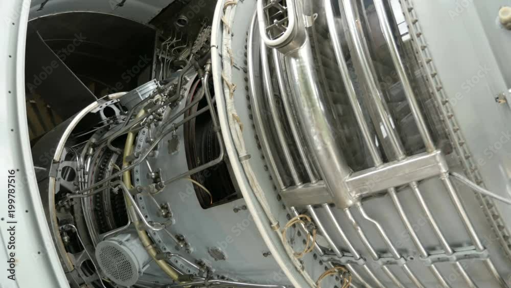 Structure of the aircraft engine with lots of pipes, pumps, compressors ...