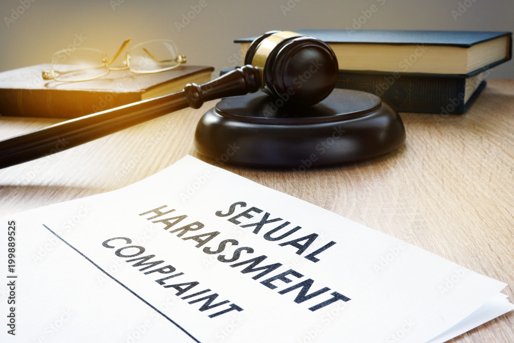 Sexual harassment complaint and gavel on a desk. Stock Photo | Adobe Stock