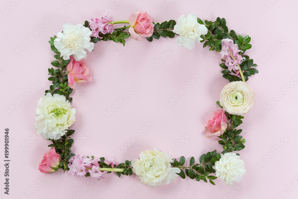 FLower frame with fresh branches of pion-shaped roses and eucalyptus ...