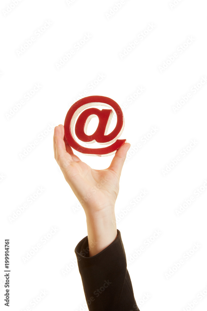 Hand mit at-Zeichen als Symbol für Email Stock Photo | Adobe Stock