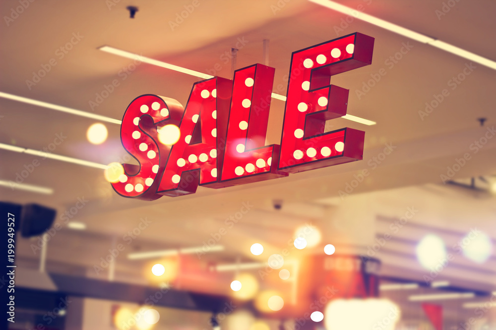 Red metal signage shop with lighting on shopping mall background Stock ...