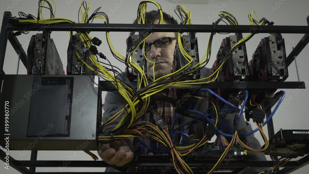 Vidéo Stock Young adult in work coat maintains a mining rig machine ...