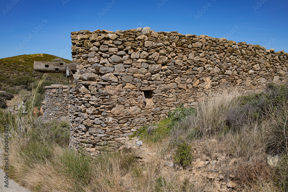 In traditional way rebuild house by archeological place - ruins in ...