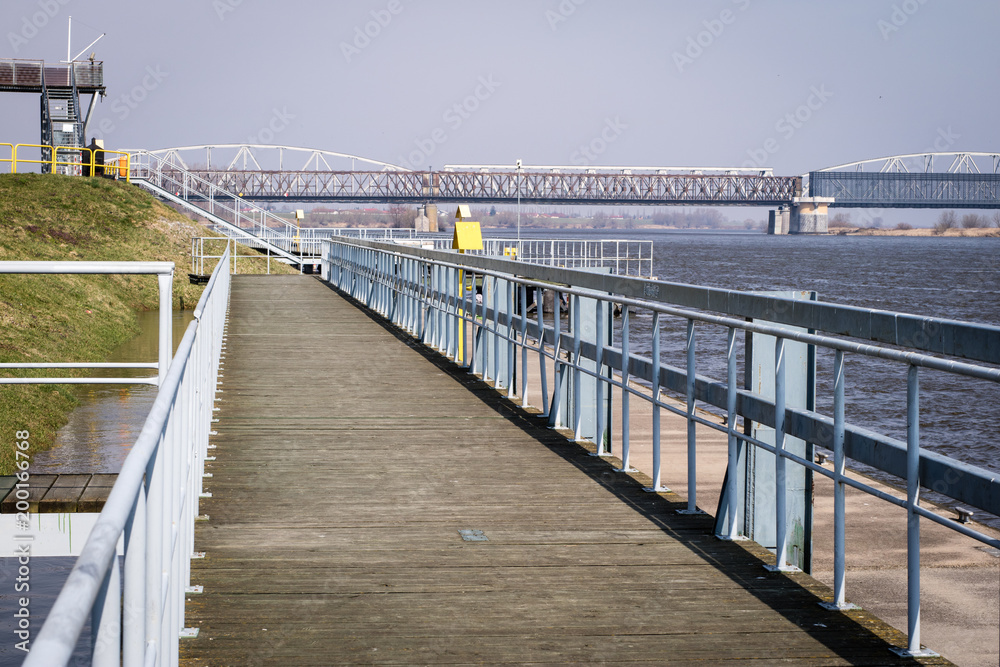 Bridge crossing across a large river. Truss bridge in the city of Tczew ...