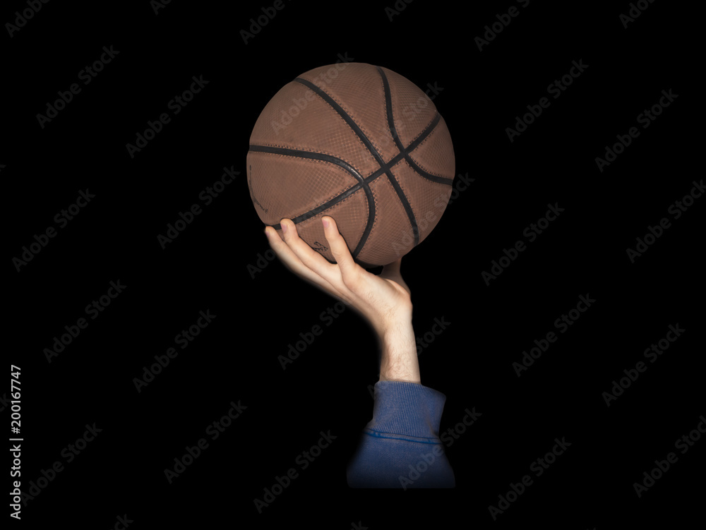 Hand Holding Basketball