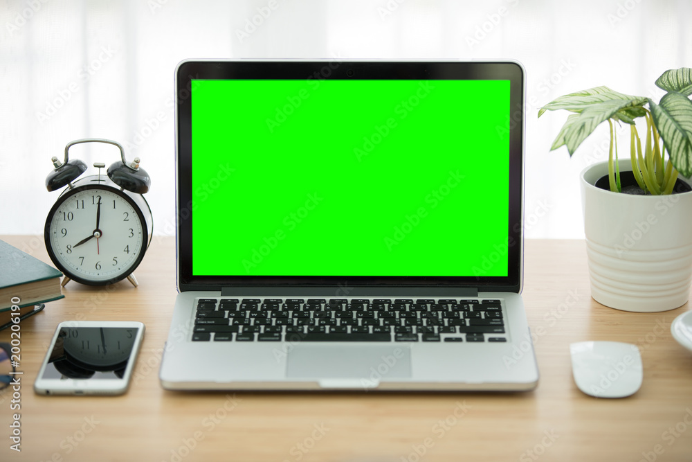Mockup image of laptop with blank green screen. Stock Photo | Adobe Stock