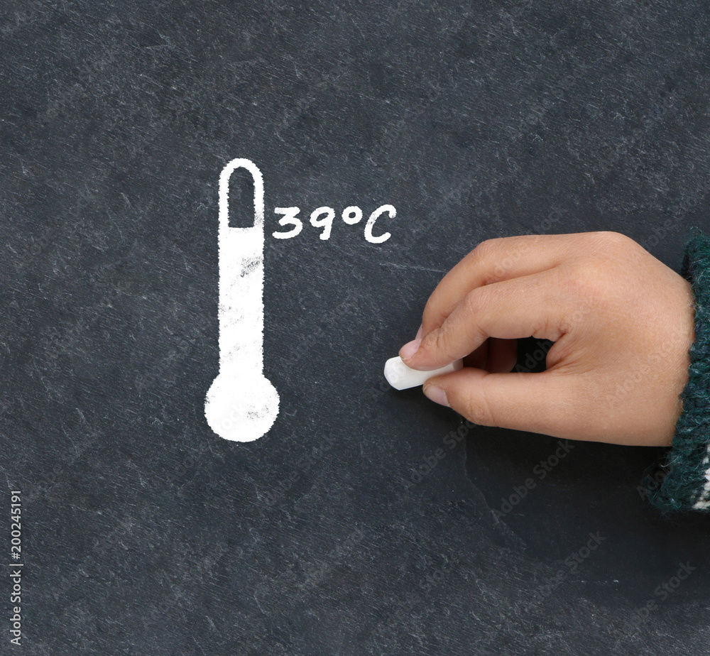 Little boy drawing high temperature on a blackboard Stock Photo | Adobe ...
