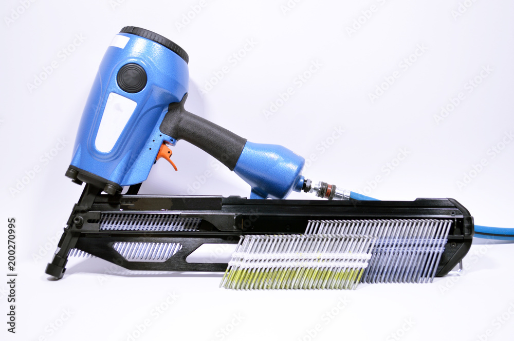pneumatic nail gun Stock Photo | Adobe Stock