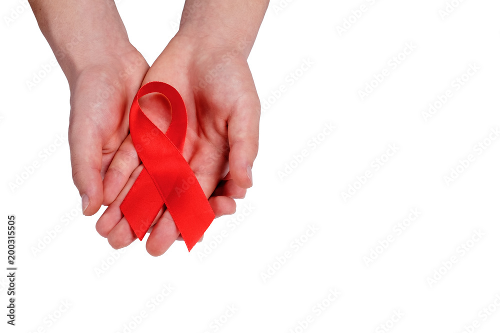 On man's crossed hands a red ribbon as symbol awareness of tuberculosis ...