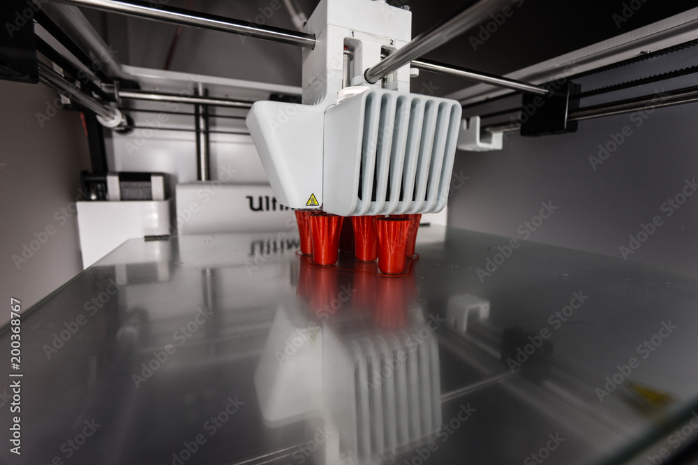 Three dimensional (3D) printing of array of glowing red plastic ...