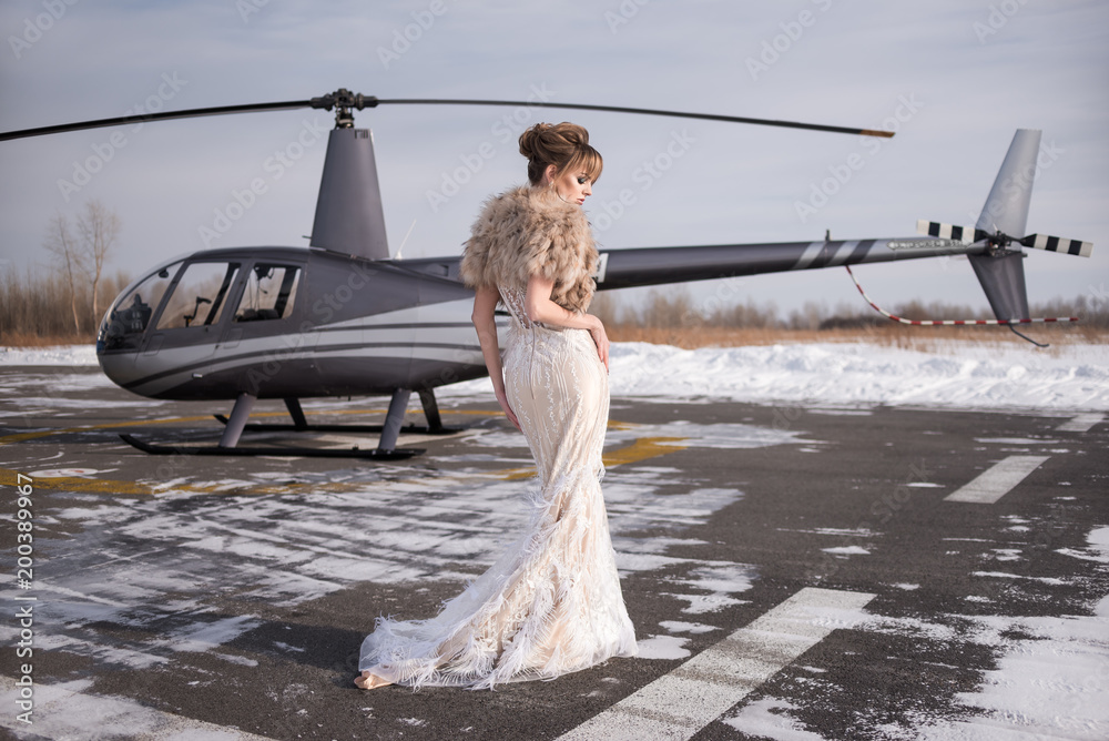 Women Getting In Helicopter Dress Blowing Up