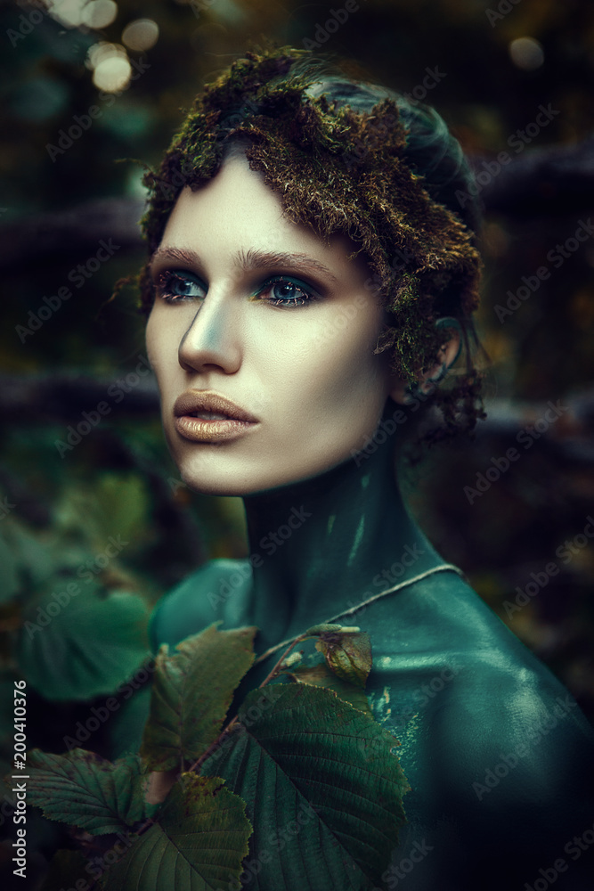Beautiful model is posing in a forest as a nature spirit Stock Photo ...